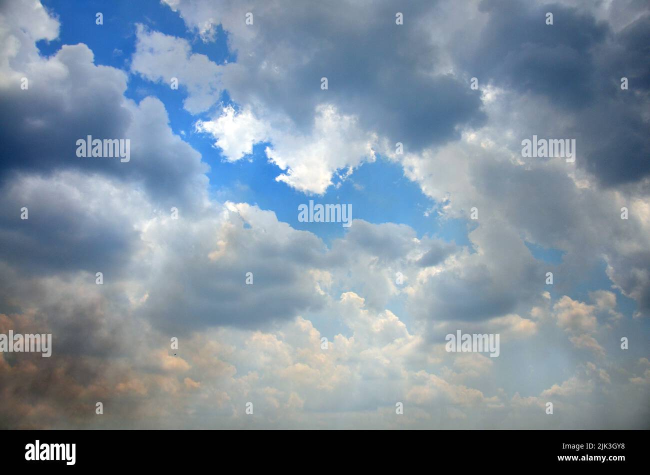 Aerial view landscape cloudscape of blue sky and beautiful clouds with ray lighting of sunlight ...