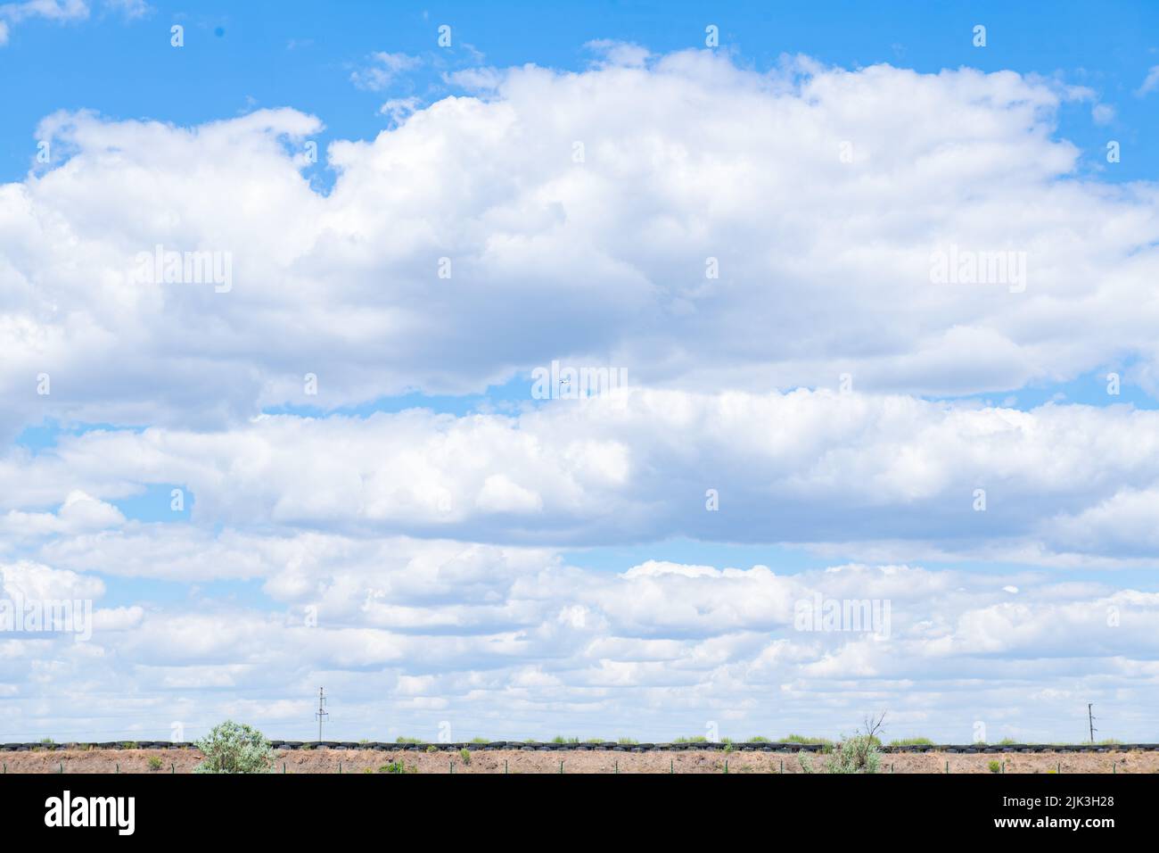 clear blue sky and clouds float across the sky Stock Photo - Alamy
