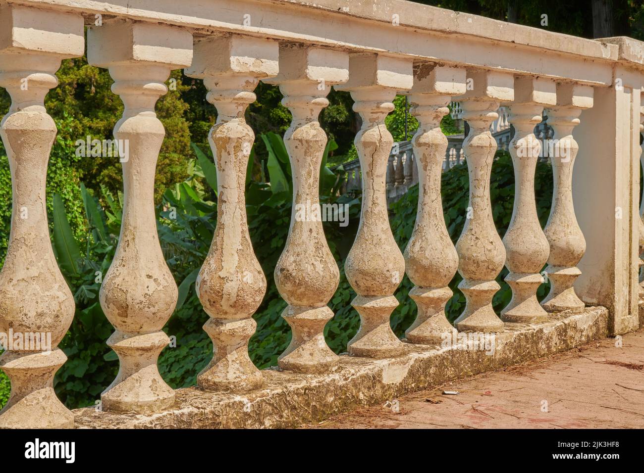 the openwork fence in the botanical garden in Batumi Stock Photo - Alamy