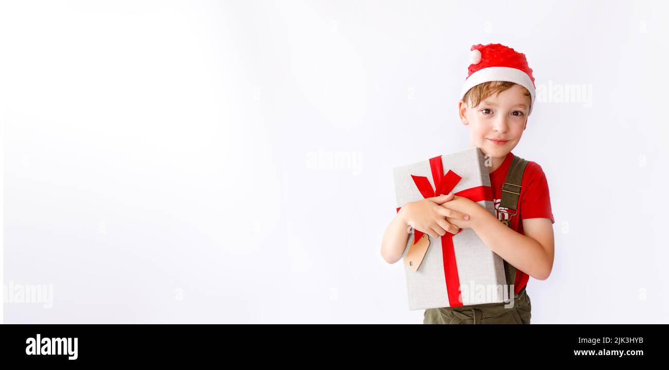 Young Boy Smiles with his Christmas Present Stock Photo - Alamy