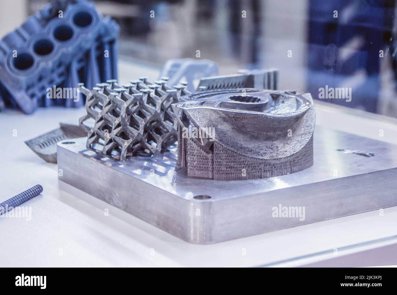 Man is holding object printed on metal 3d printer. Object printed in ...