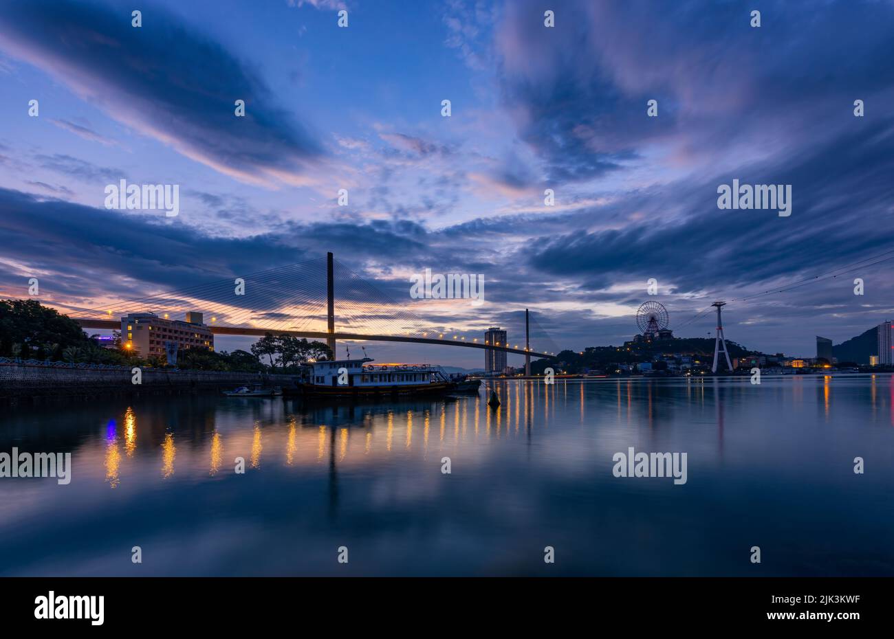 Bai Chay bridge in Ha Long city, Quang Ninh province, Vietnam in sunset ...