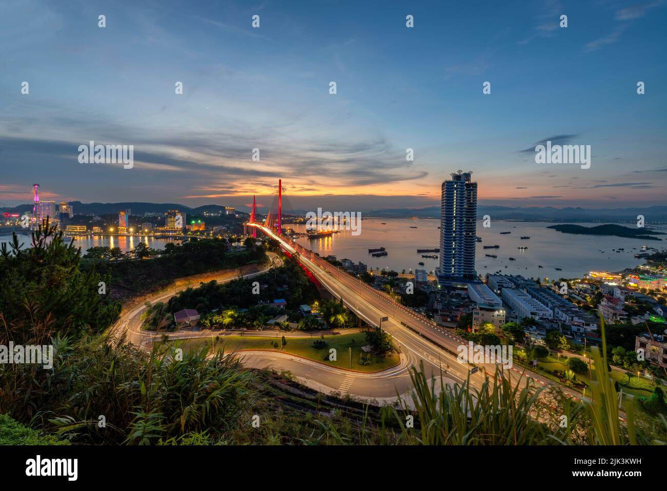 Bai Chay bridge in Ha Long city, Quang Ninh province, Vietnam in sunset ...