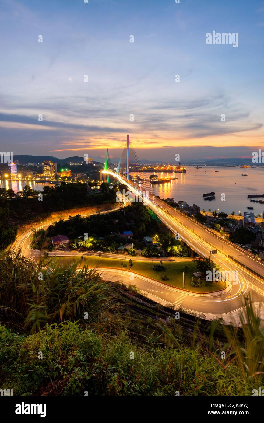 Bai Chay bridge in Ha Long city, Quang Ninh province, Vietnam in sunset ...