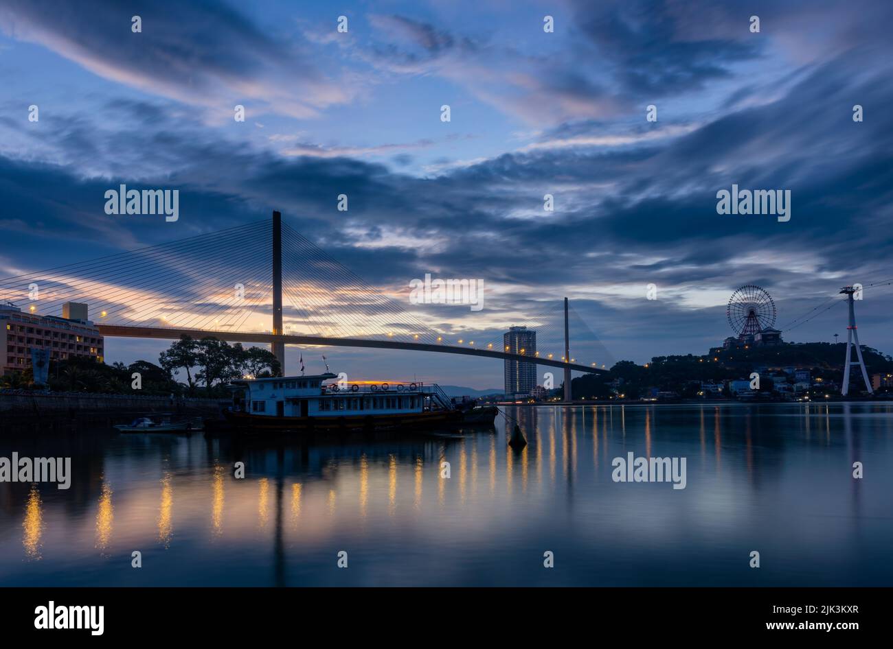Bai Chay bridge in Ha Long city, Quang Ninh province, Vietnam in sunset ...