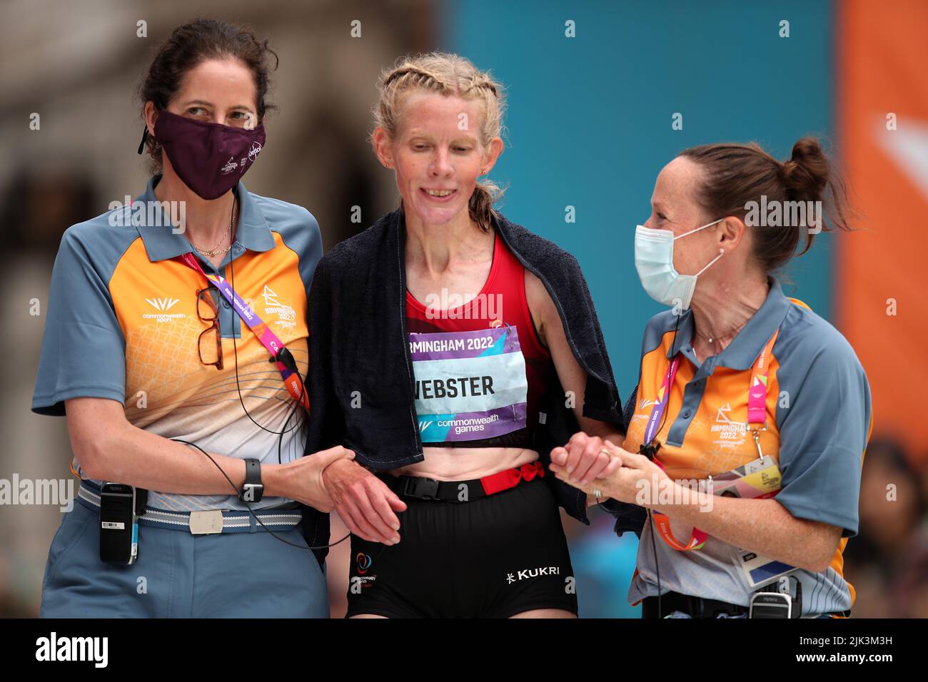 Isle of Man’s Sarah Webster is helped by stewards after crossing the ...