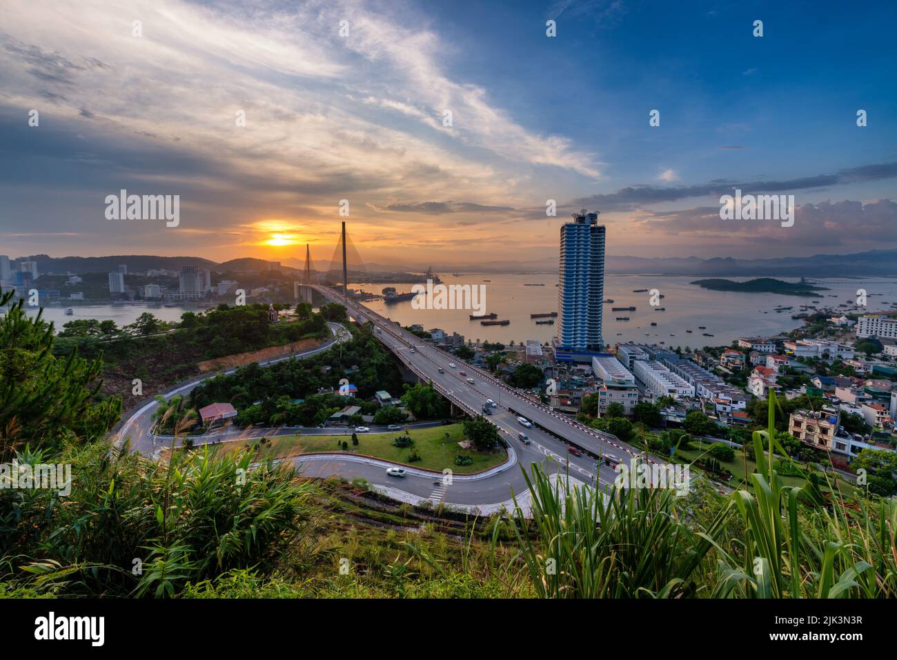 Bai Chay bridge in Ha Long city, Quang Ninh province, Vietnam in sunset ...