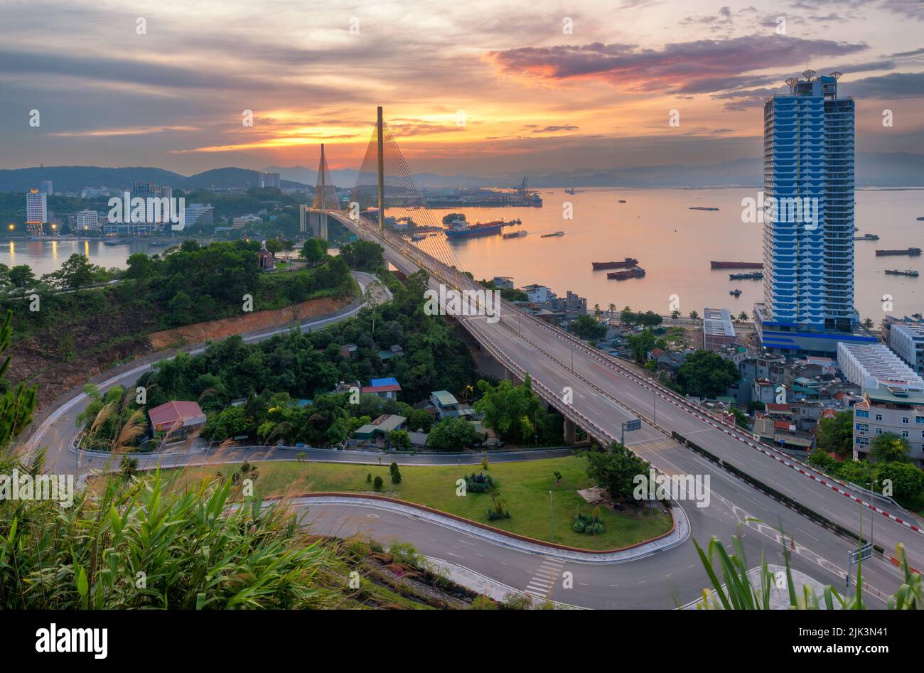 Bai Chay bridge in Ha Long city, Quang Ninh province, Vietnam in sunset ...