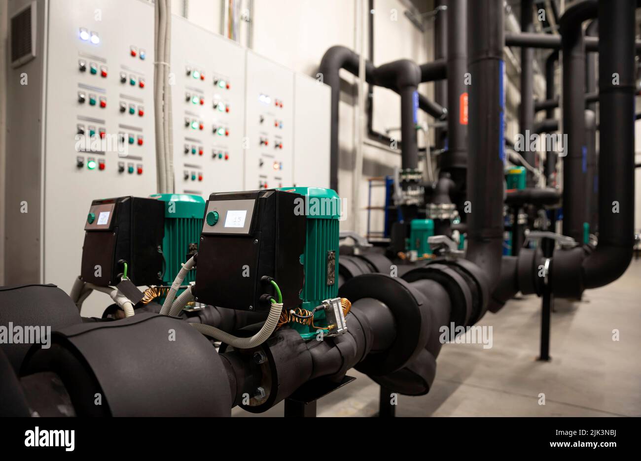 Cooling system of a supercomputer. Pipes with electrical motors and ...