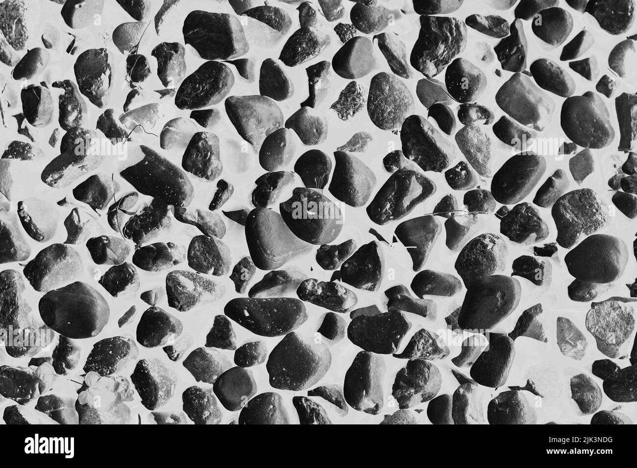 Full frame top view of rocks and stones covering the ground surface in ...