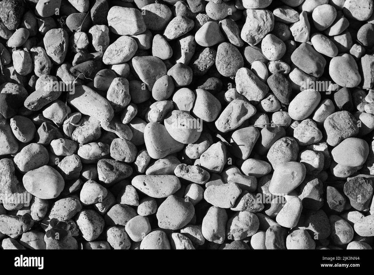 Full frame top view of rocks and stones covering the ground surface in ...
