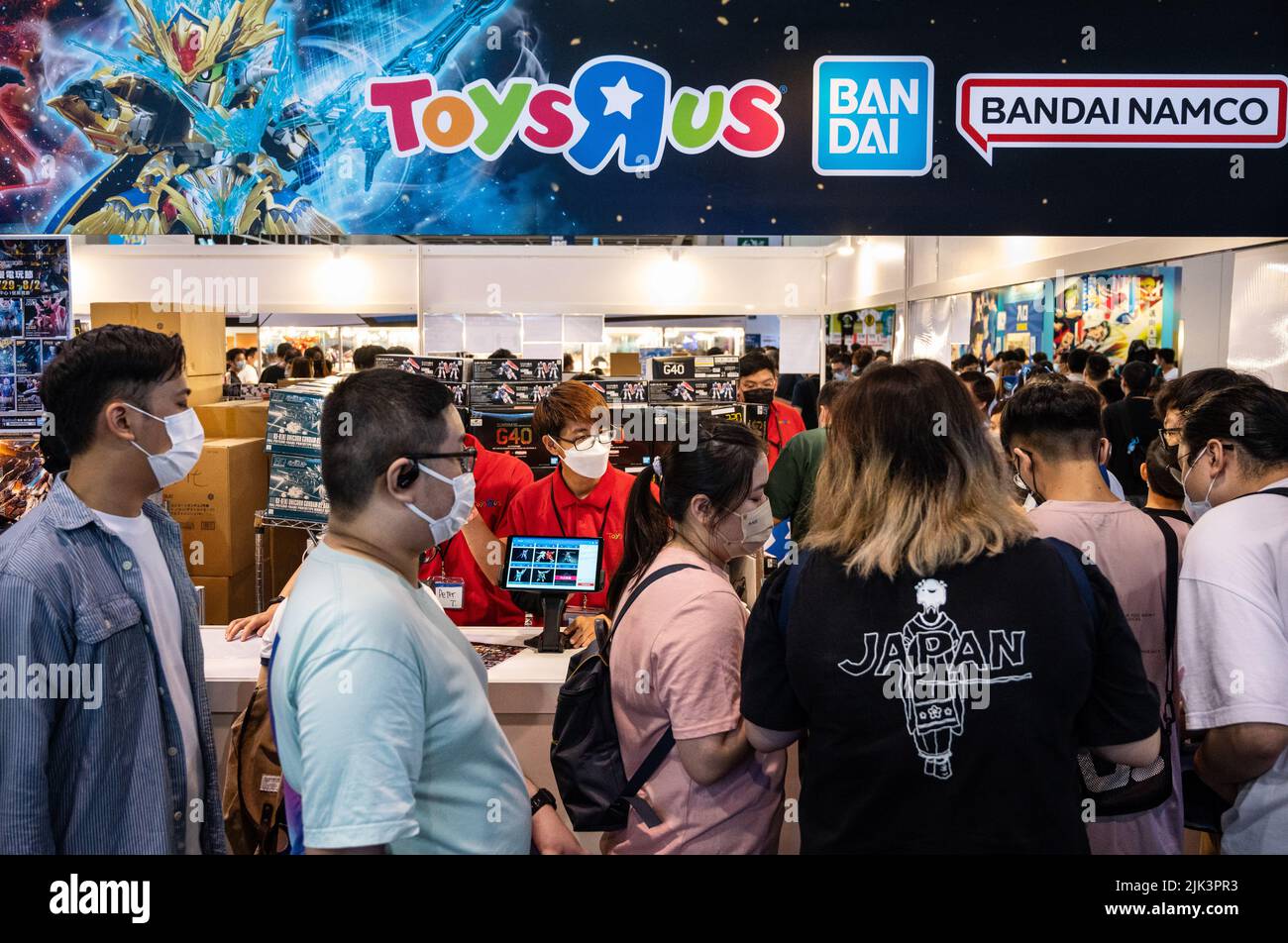Visitors queue in lin at the booth from the American multinational toy ...