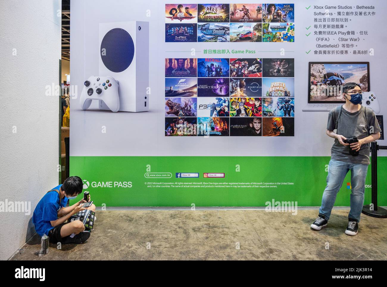 Hong Kong, China. 29th July, 2022. Visitors are seen outside the booth from the American video ...