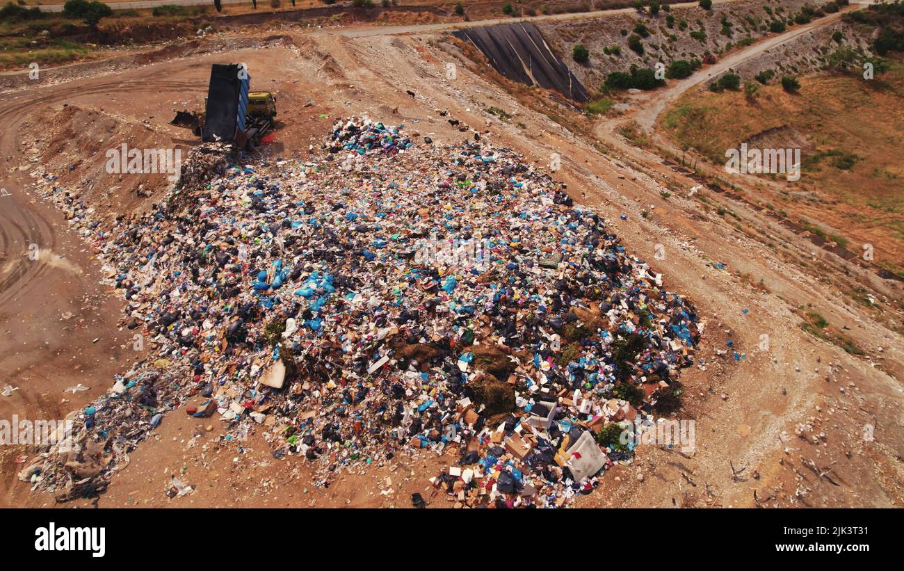 Dark side of consumerism. Waste dump with mainly plastic garbage on the ...