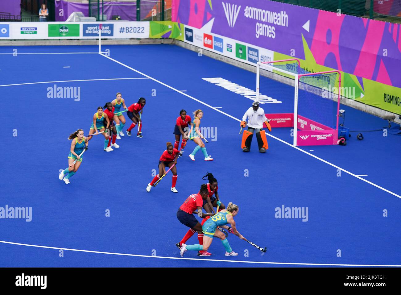 Australia's Jane-Anne Claxton (bottom) hits the ball across goal during ...
