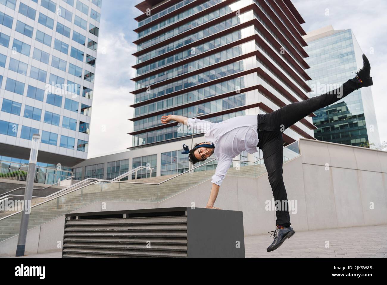 Happy and handsome adult businessman wearing elegant suit doing ...