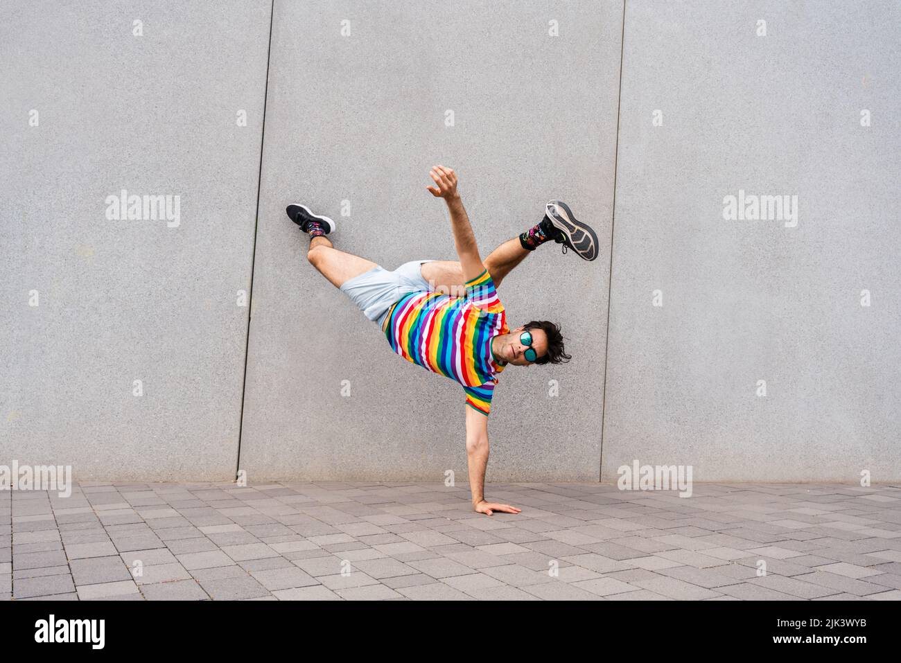 Happy and handsome adult businessman wearing elegant suit doing ...