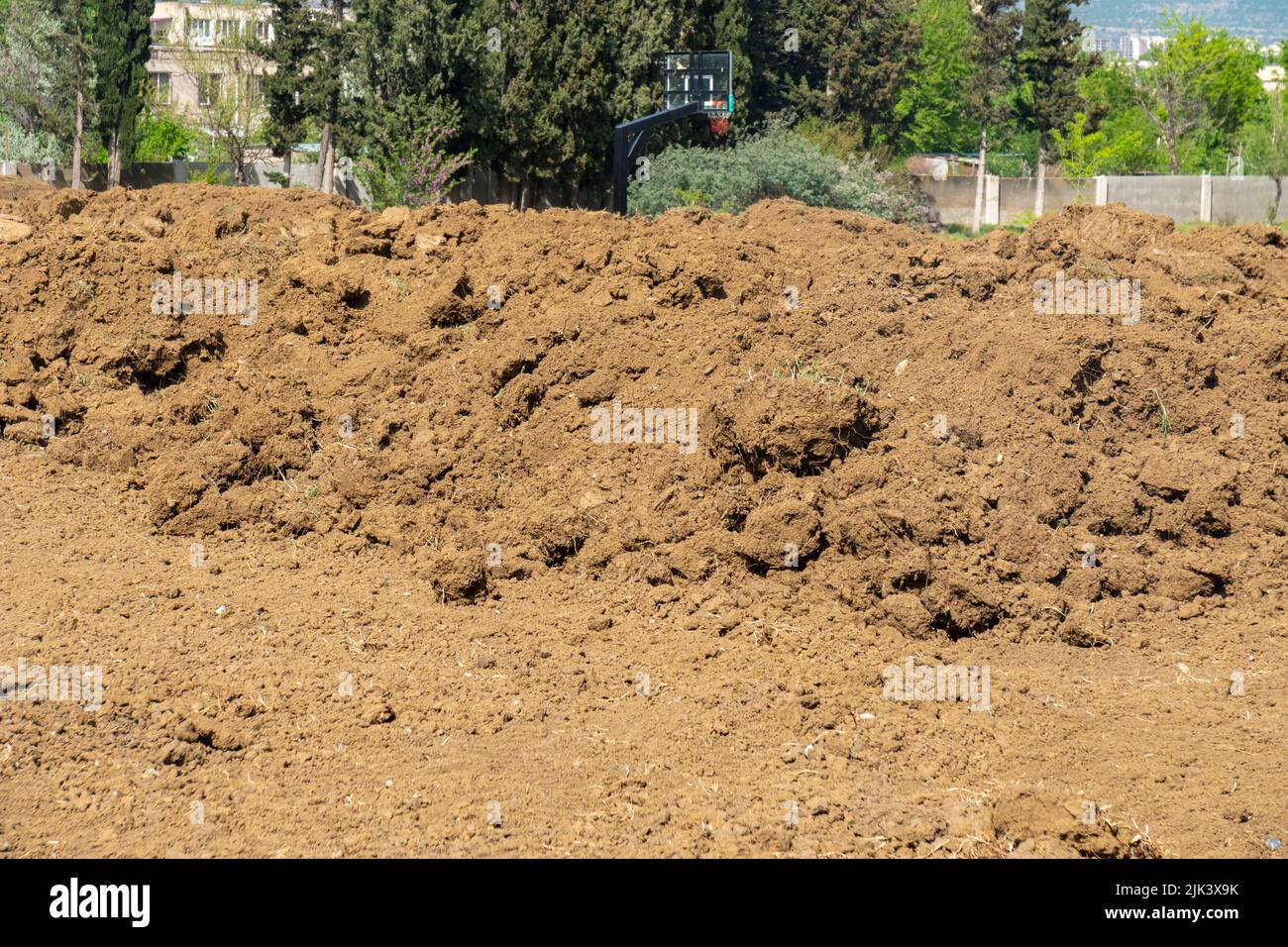 Pile of brown Soil. Construction dirt pile. Industry Stock Photo - Alamy