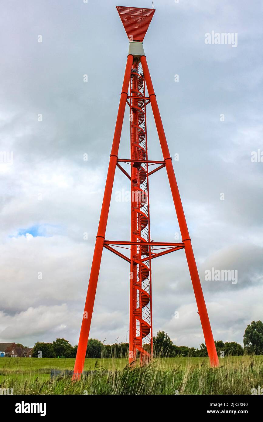 Industrial area cranes and red tower lighthouse with beautiful ...