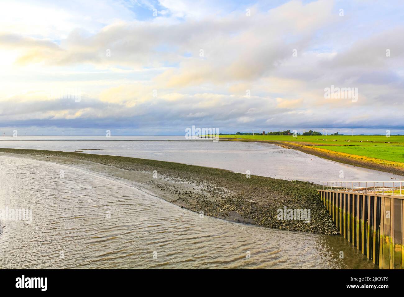 Industrial area cranes and red tower lighthouse with beautiful ...