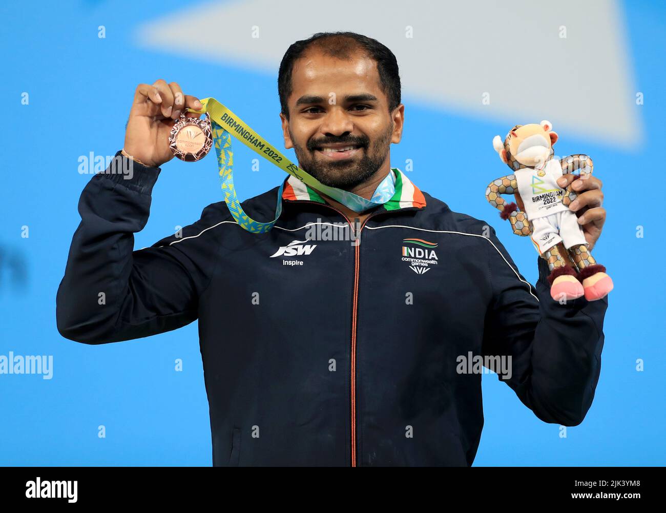 India’s Gururaja Gururaja celebrates after winning Bronze in the 61kg ...