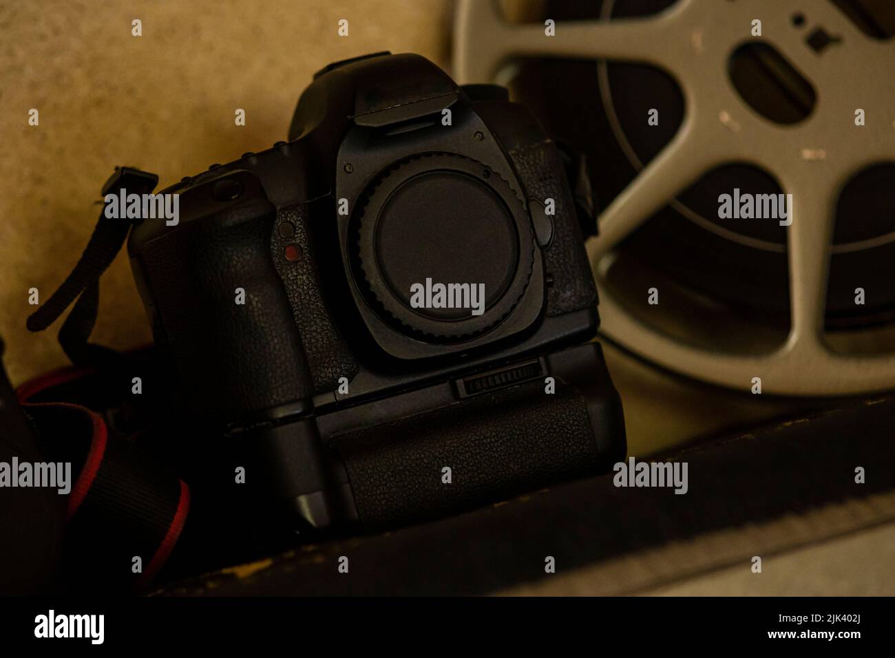 Digital camera and old film reel, Ancient Movie Film Reel and modern ...