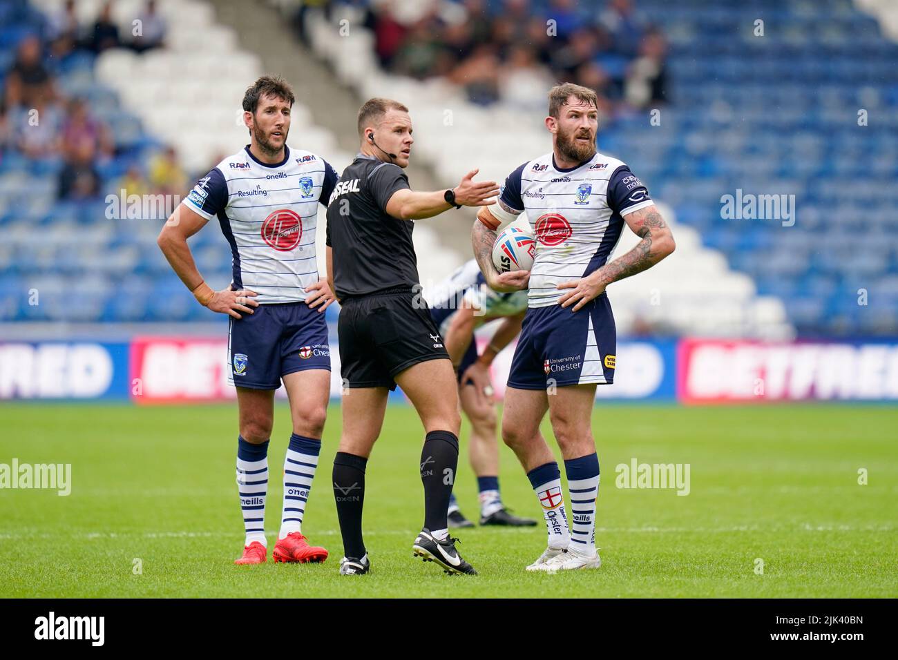 Stefan Ratchford #1 and Daryl Clark of Warrington Wolves debate a kick ...