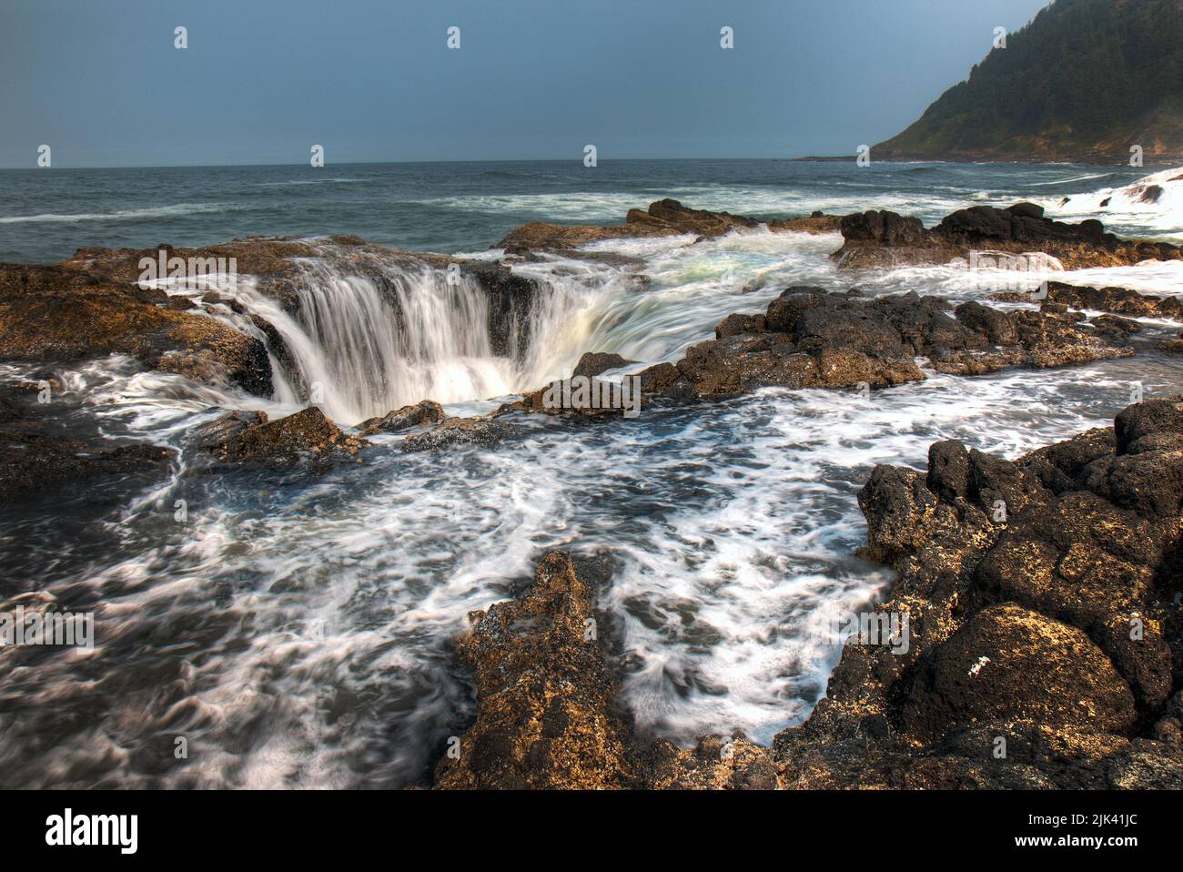 Sinkhole known as Thor's Well on the coast of Oregon Stock Photo - Alamy