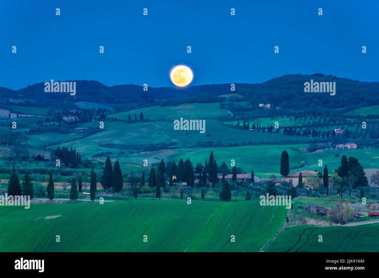 A beautiful full moon over the countryside of Tuscany, Italy Stock ...