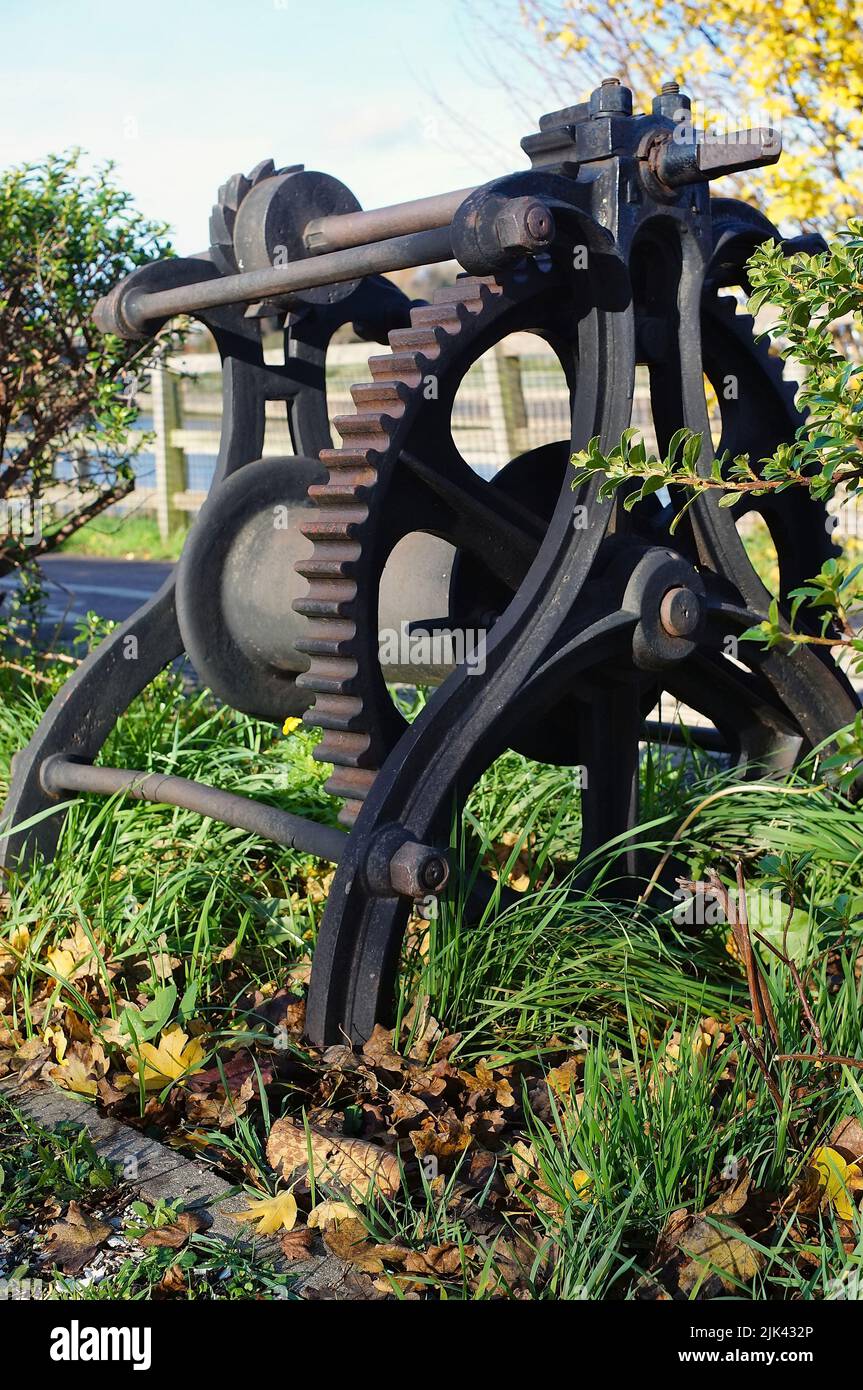 Vintage hand operated winding gear abandoned on a grass verge Stock ...