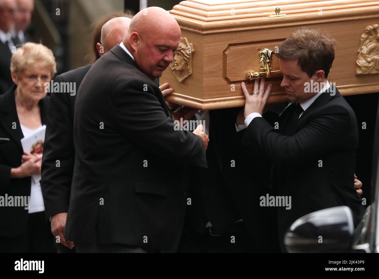 Declan Donnelly (front right) carrying the coffin of his brother ...
