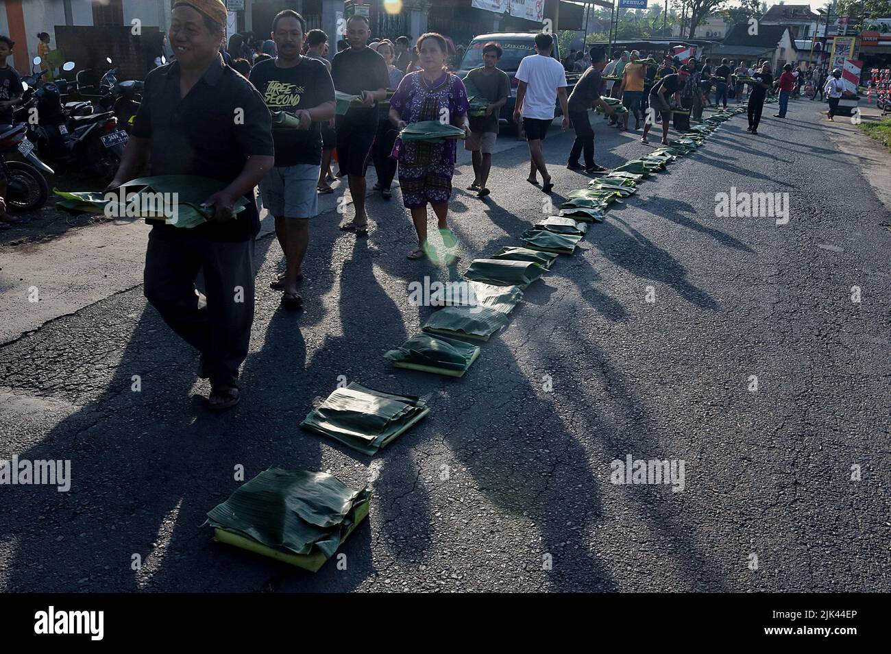 Banyuwangi, East Java, Indonesia. 30th July, 2022. Residents carry out ...