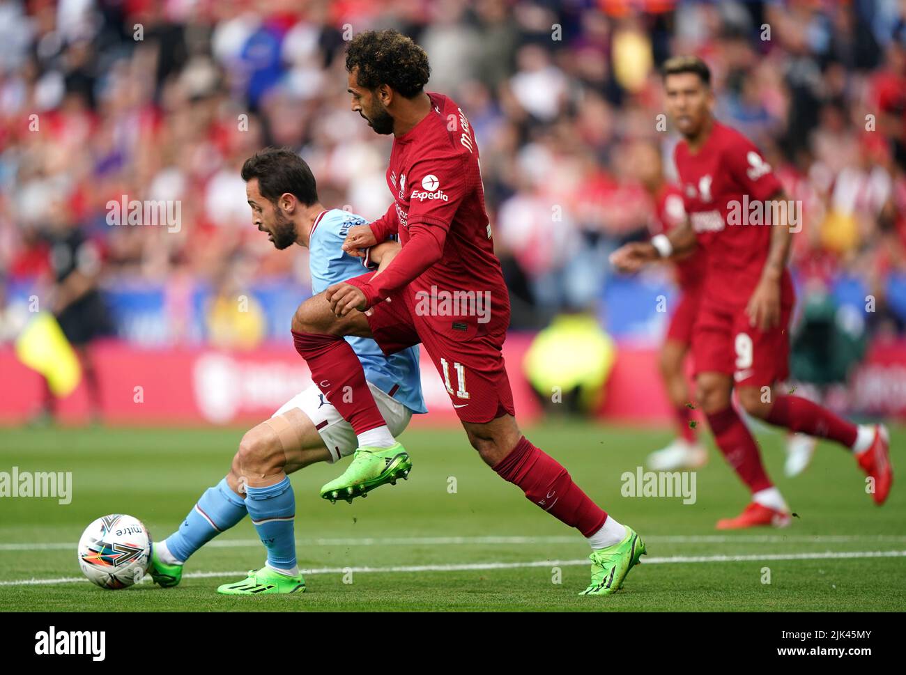 Manchester City's Bernardo Silva (left) and Liverpool's Mohamed Salah ...