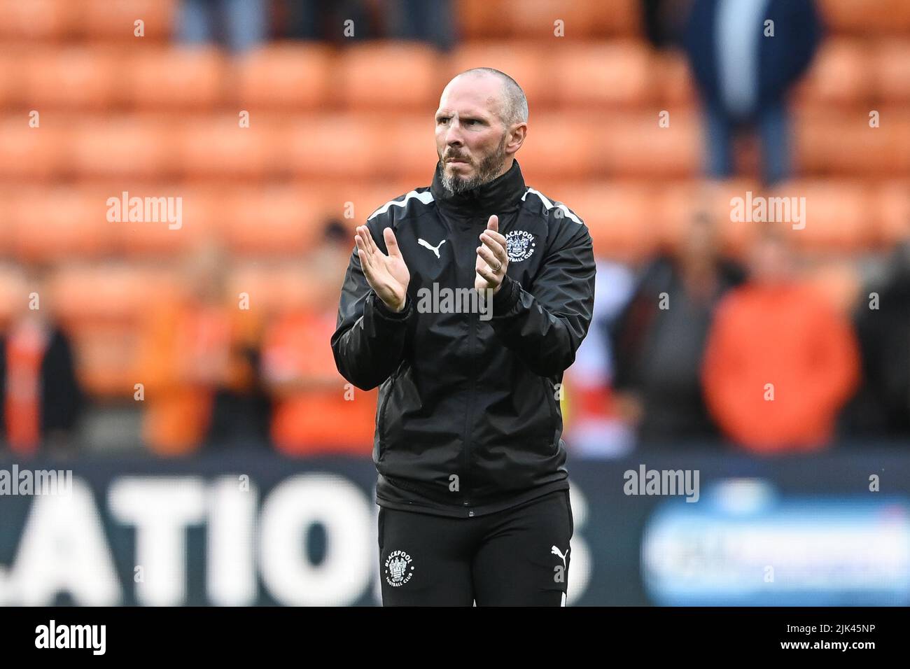 Michael Appleton manager of Blackpool applauds the fans at the end of ...