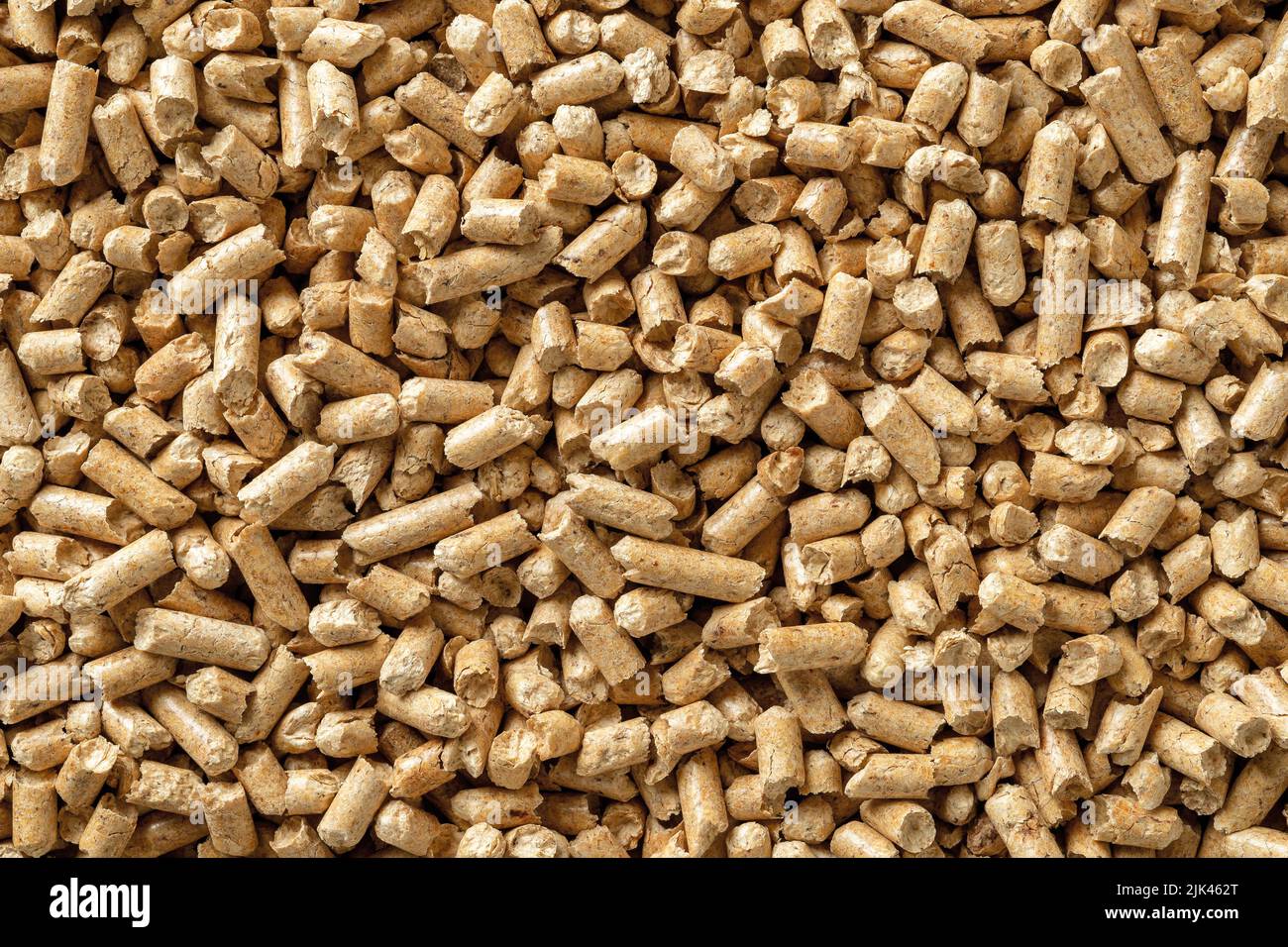 Wood pellets background. Texture of compacted sawdust granules ...