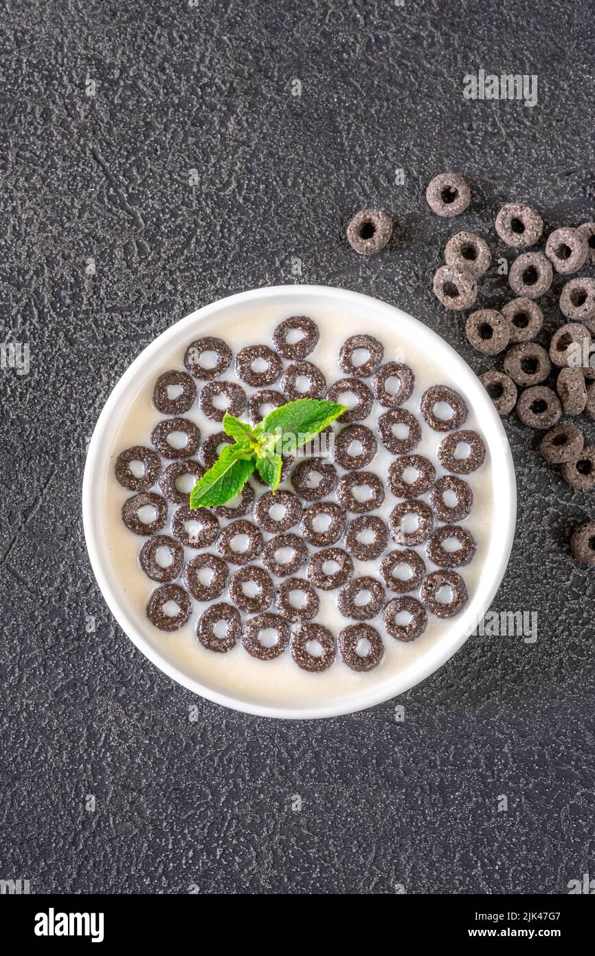 Bowl of cereal cookie rings with milk Stock Photo - Alamy