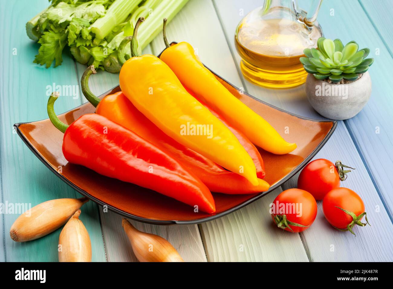 long pepper on wood background Stock Photo - Alamy
