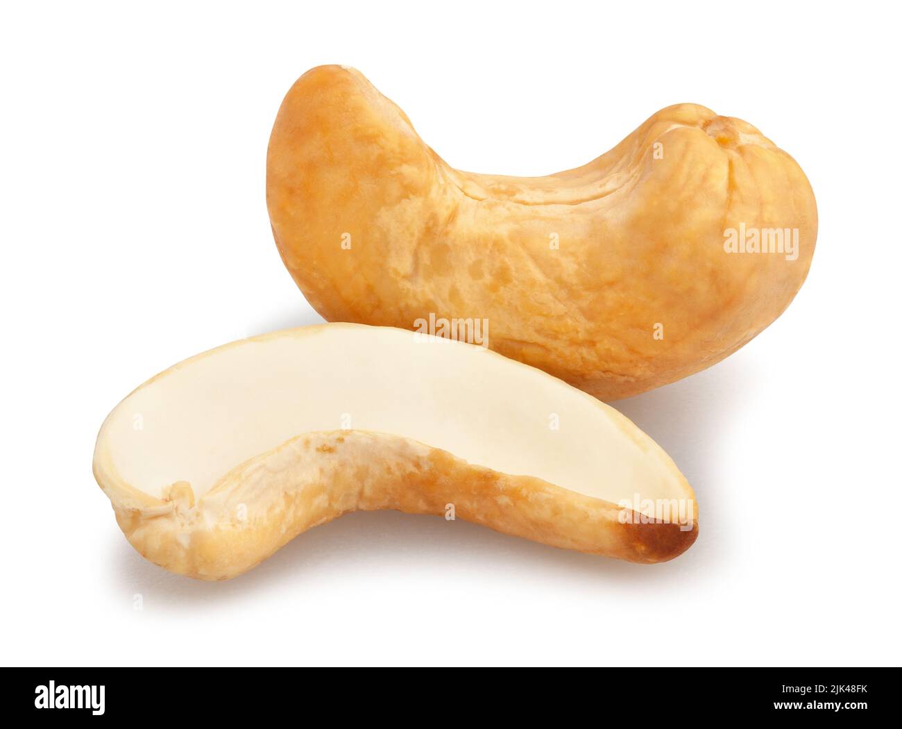 sliced cashew path isolated on white Stock Photo - Alamy