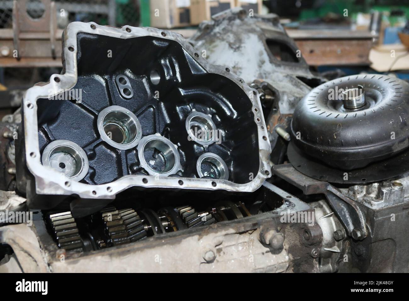 Large gears of a truck. The engine and shaft with gears are ...