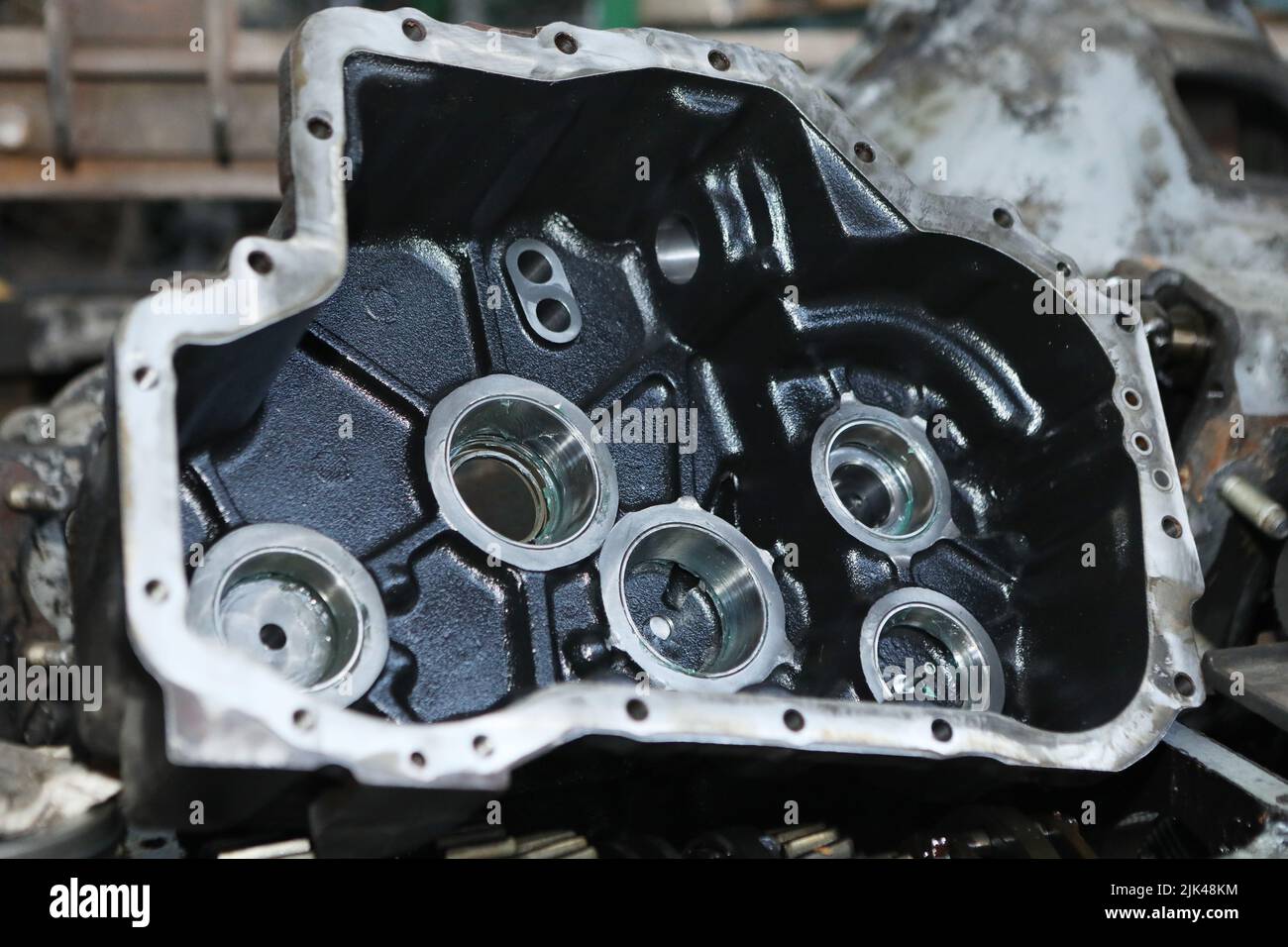 Large gears of a truck. The engine and shaft with gears are ...