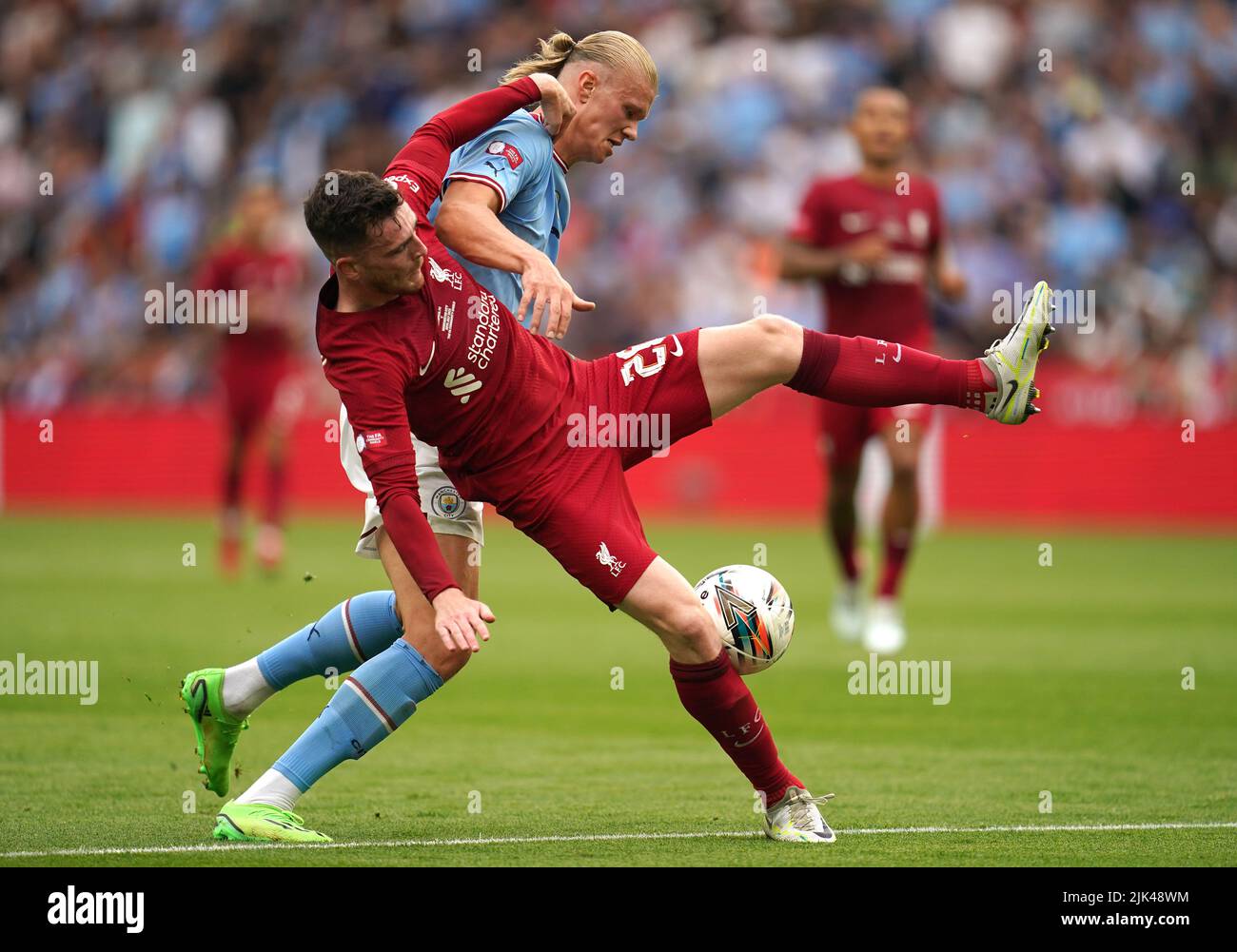Manchester City's Erling Haaland and Liverpool's Andrew Robertson ...