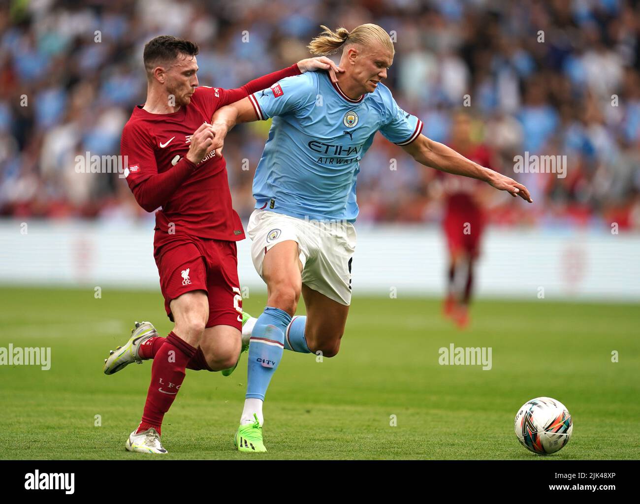 Manchester City's Erling Haaland and Liverpool's Andrew Robertson ...
