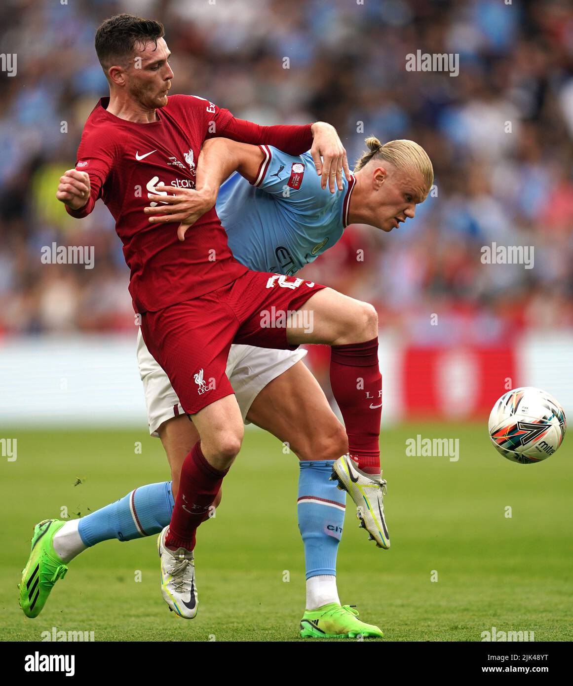 Manchester City's Erling Haaland and Liverpool's Andrew Robertson ...