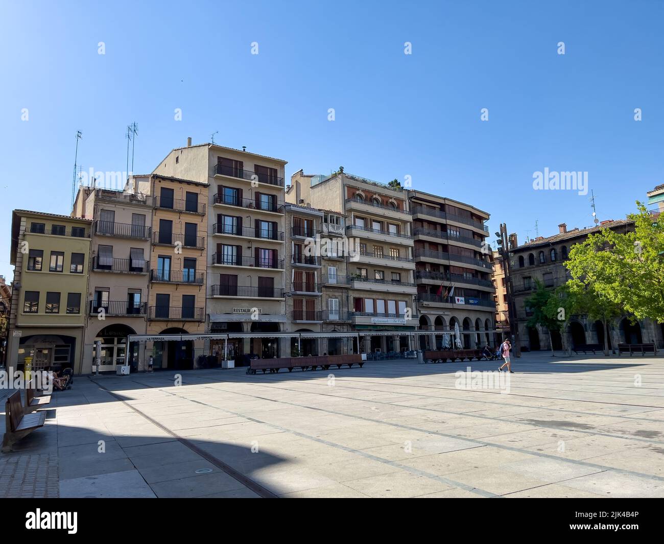 a town square with cafes. restaurants and pavement seating Stock Photo ...