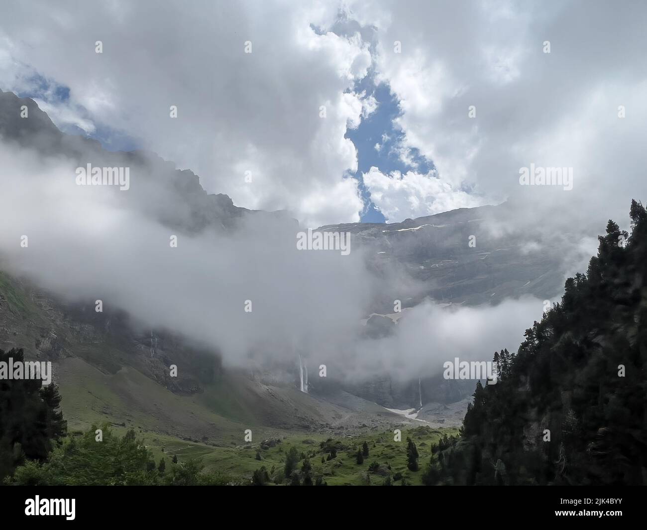 the Cirque de Gavarnie (Pyrenees) with cloud filling the valley and ...