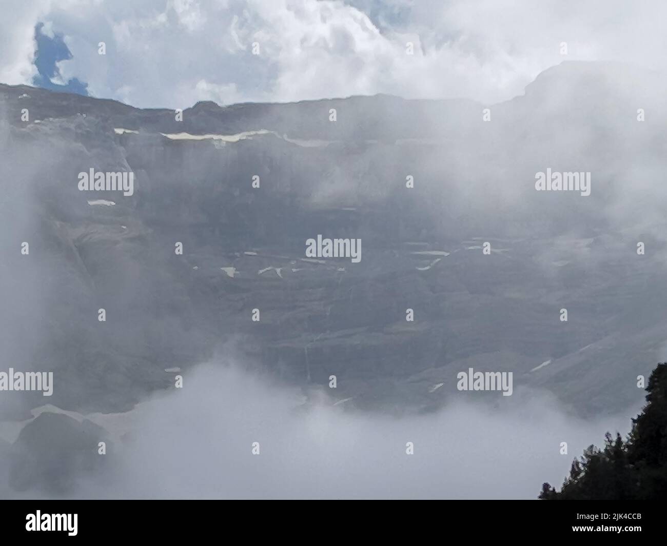 the Cirque de Gavarnie (Pyrenees) with cloud filling the valley and ...