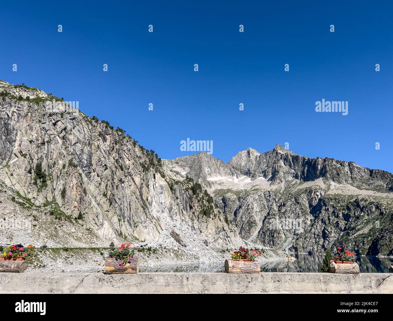 Lac de Cap-de-Long reservoir high amongst Pyrenees mountains in France ...