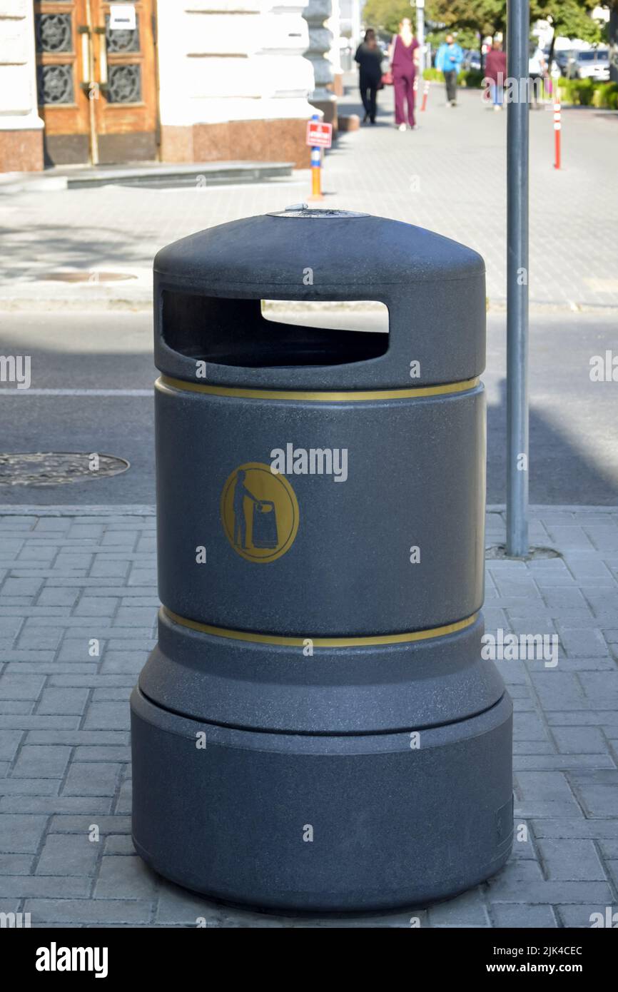 Garbage can on city street. Trash can close-up. Concept of cleanliness and ecology. Selective ...