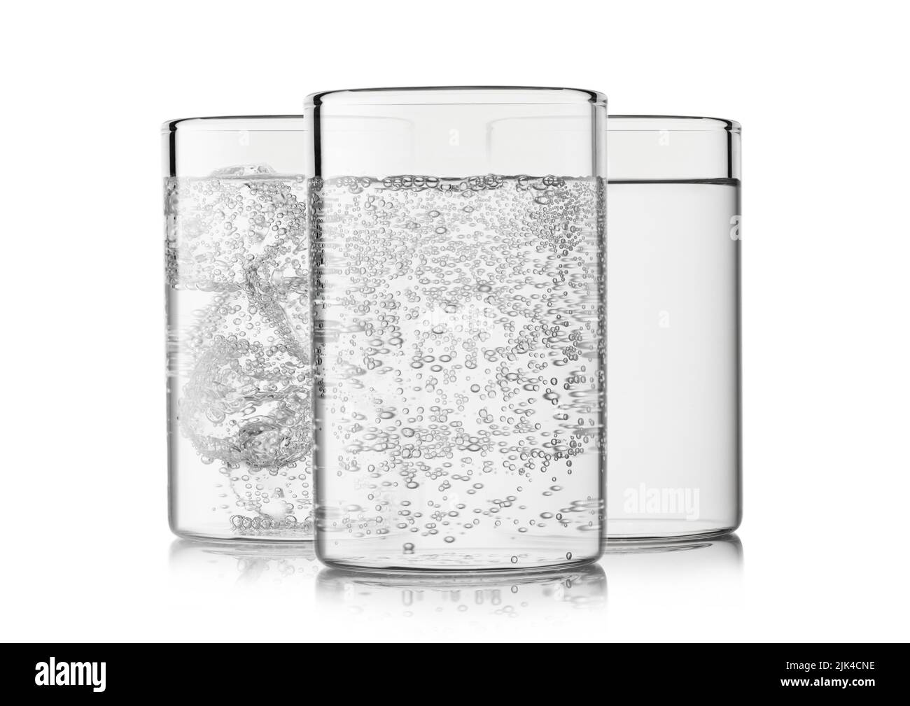 Glasses with still and sparkling water with ice cubes and bubbles on white Stock Photo - Alamy