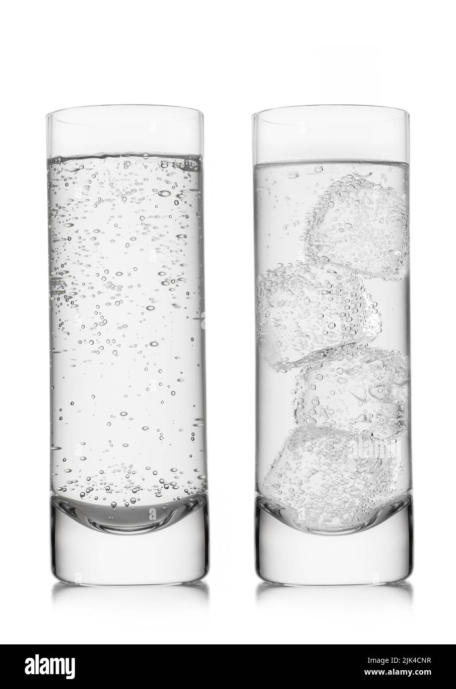 Mineral sparkling water with ice cubes on white in highball glasses Stock Photo - Alamy